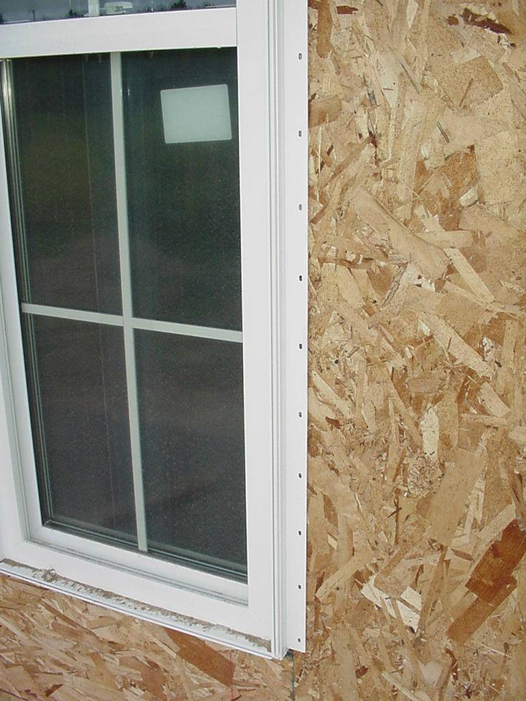 A window fastened with nailing fins. - Thermapan Structural Insulated ...
